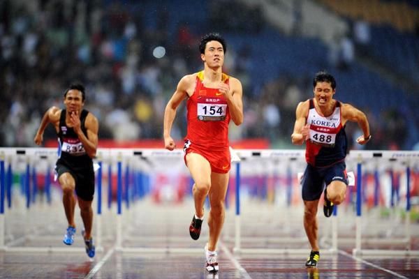 Taking centre stage, Liu Xiang beats the rain to take Asian title ...